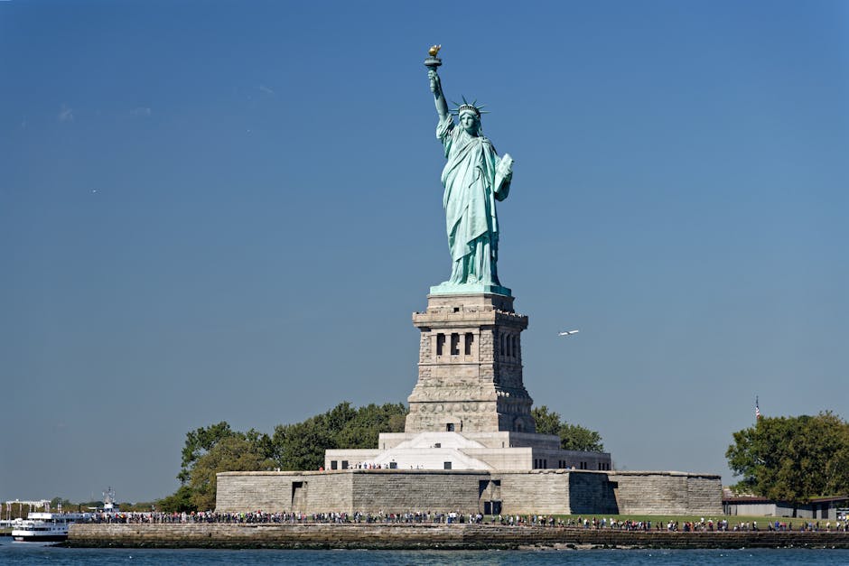 What is at the feet of the Statue of Liberty? - Spark Trivia